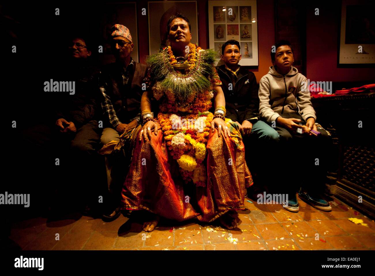 Lalitpur, Nepal. 4th Nov, 2014. An artist in traditional attire ...