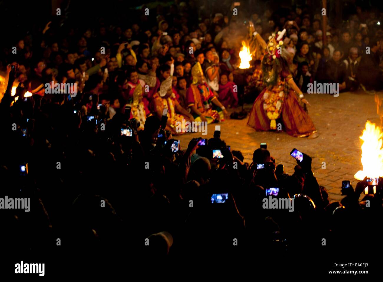 Lalitpur, Nepal. 4th Nov, 2014. An artist in traditional attire ...