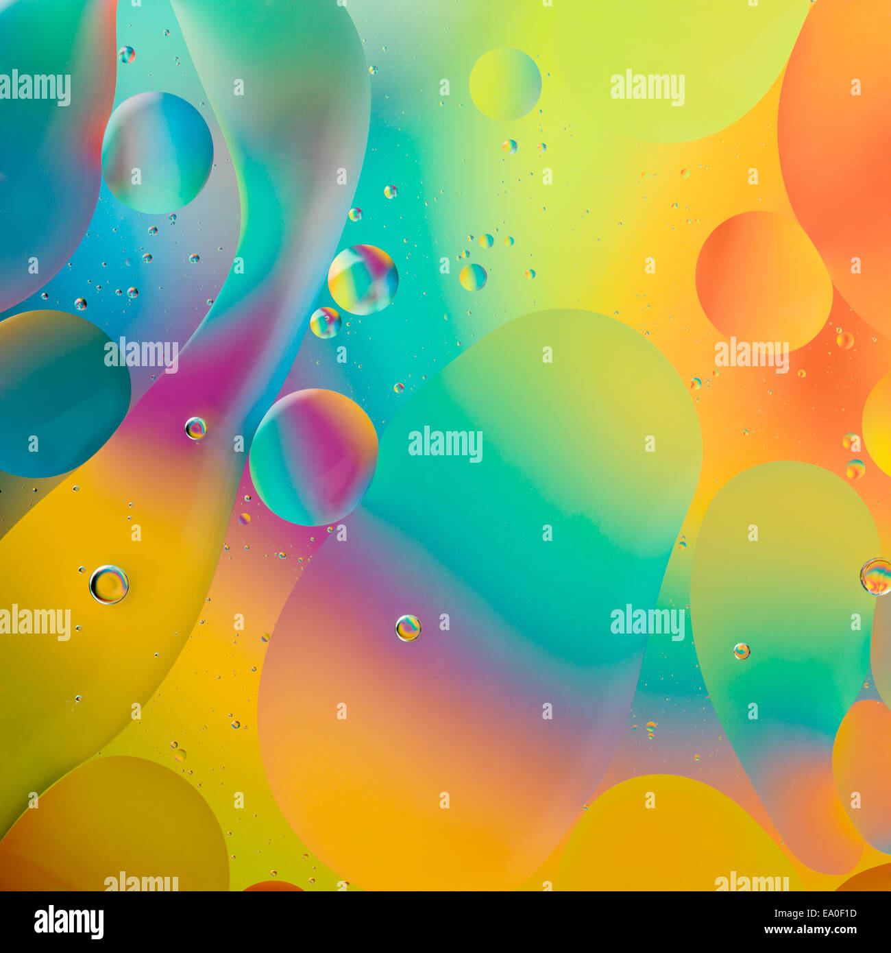 oil drops on water with colorful gradient background Stock Photo - Alamy
