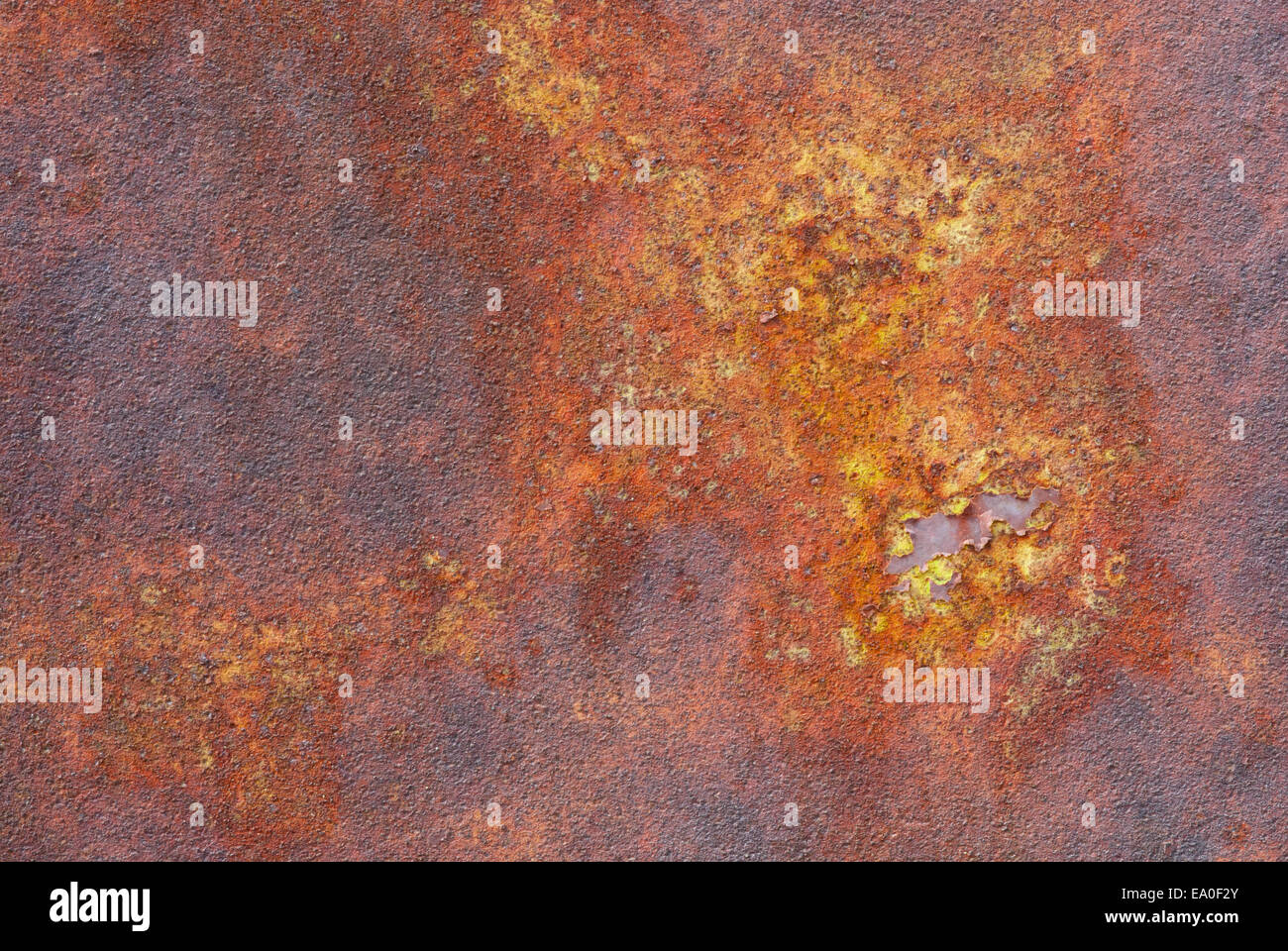Sheet of rusty metal and peeling paint background texture Stock Photo ...