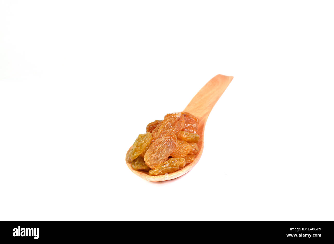 Raisin and wooden spoon isolated on white background Stock Photo - Alamy