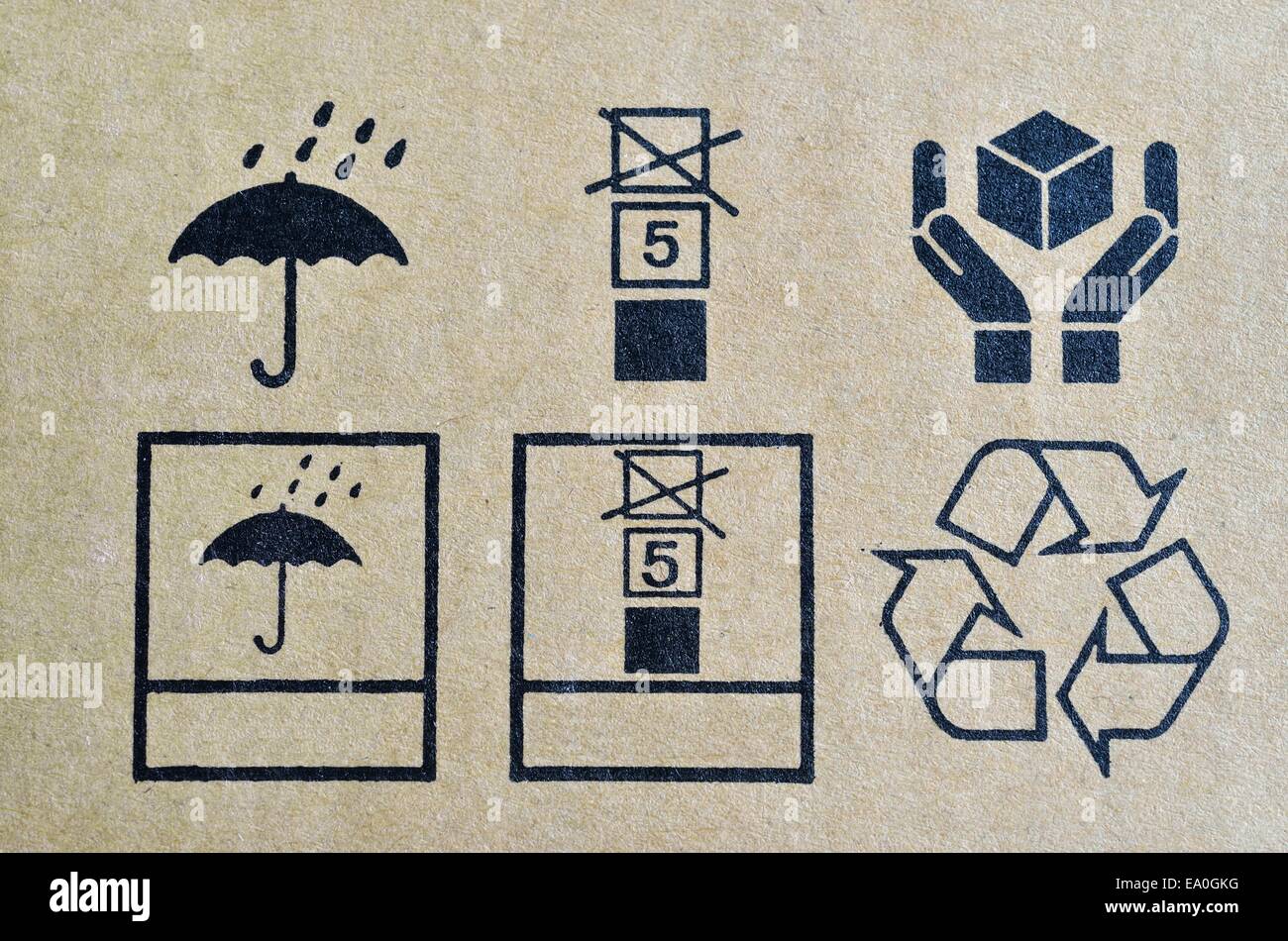 grunge color fragile symbol on cardboard Stock Photo - Alamy