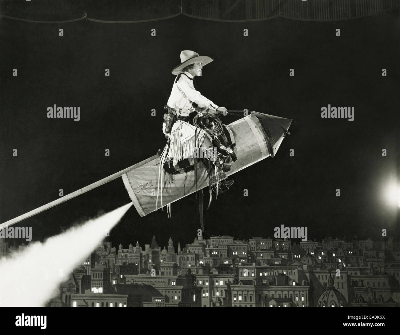 Cowgirl takes off on a rocket Stock Photo - Alamy