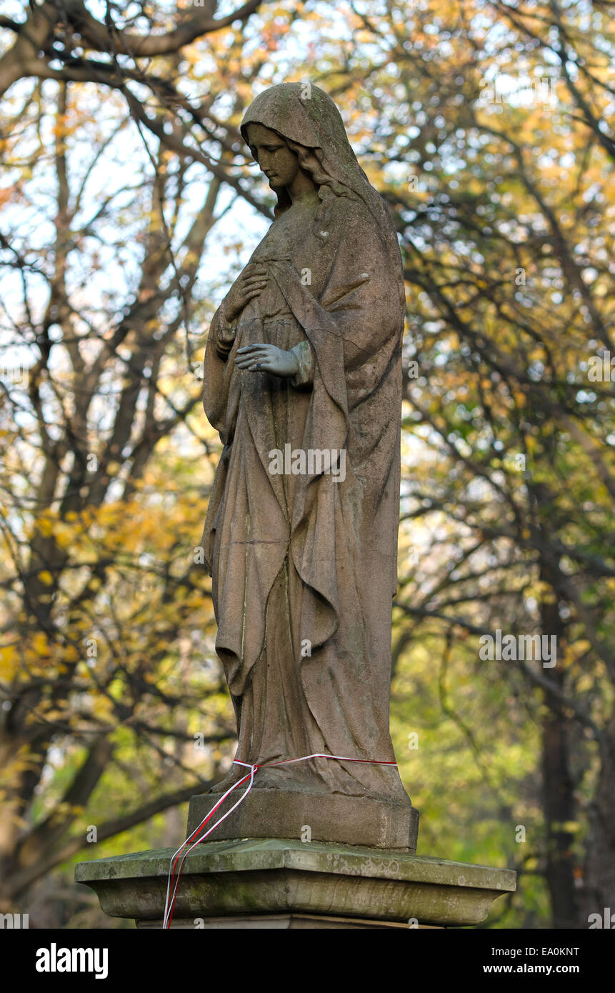 Poland, Warsaw: Statue of Mary at the Powazki Cemetery, the oldest and ...