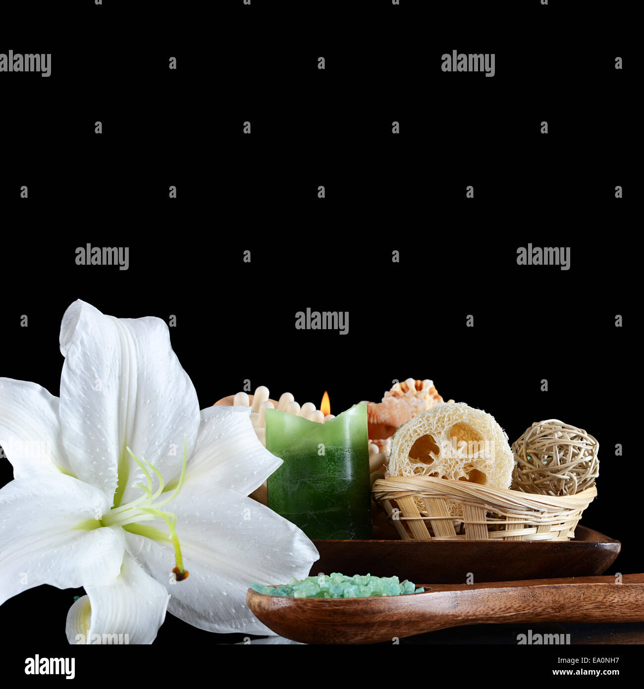 Sea salt and lily flower Stock Photo - Alamy