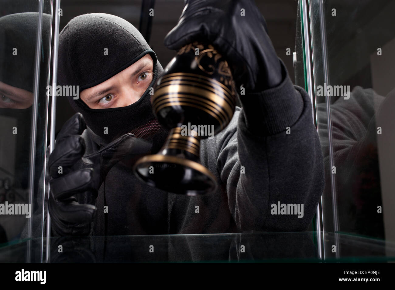 burglar wearing black mask Stock Photo - Alamy