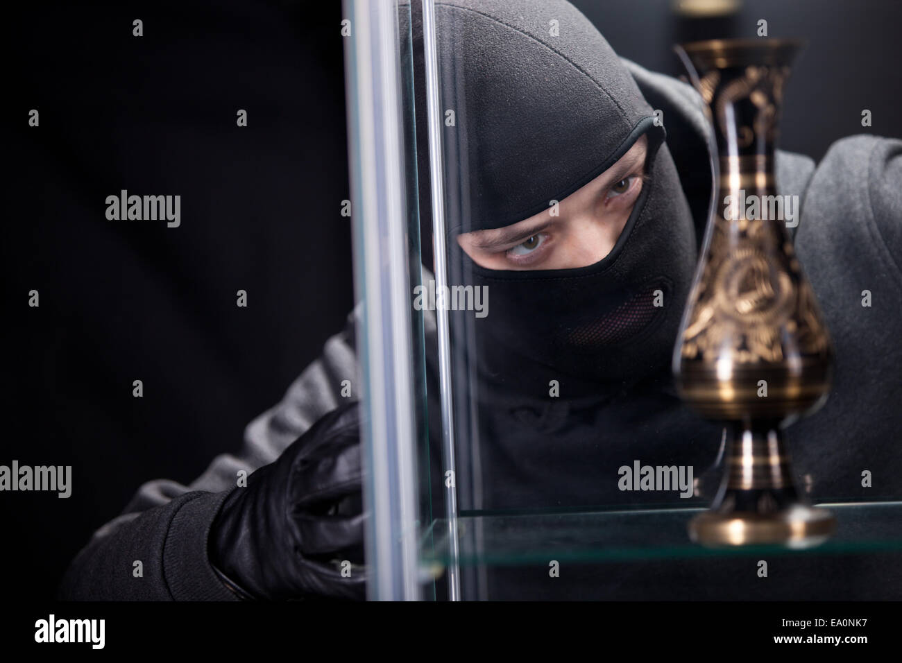 burglar wearing black mask Stock Photo - Alamy