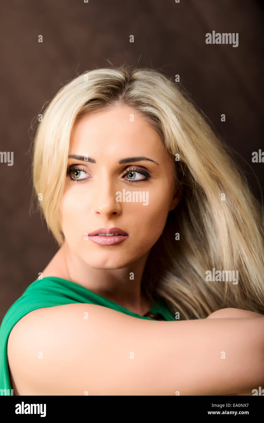 Blond woman in grey hi-res stock photography and images - Alamy