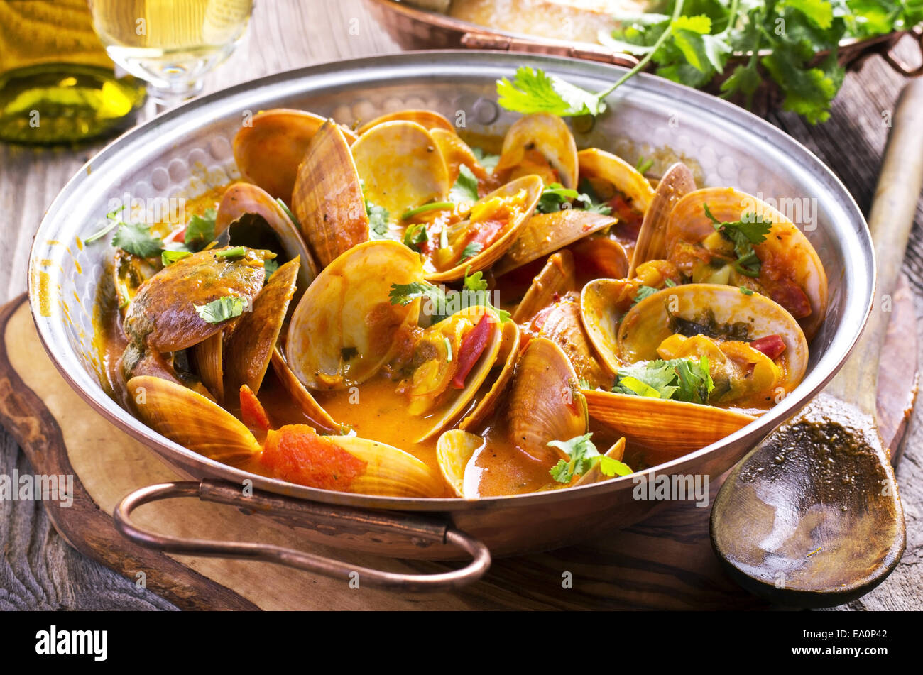 clams in tomato sauce Stock Photo - Alamy