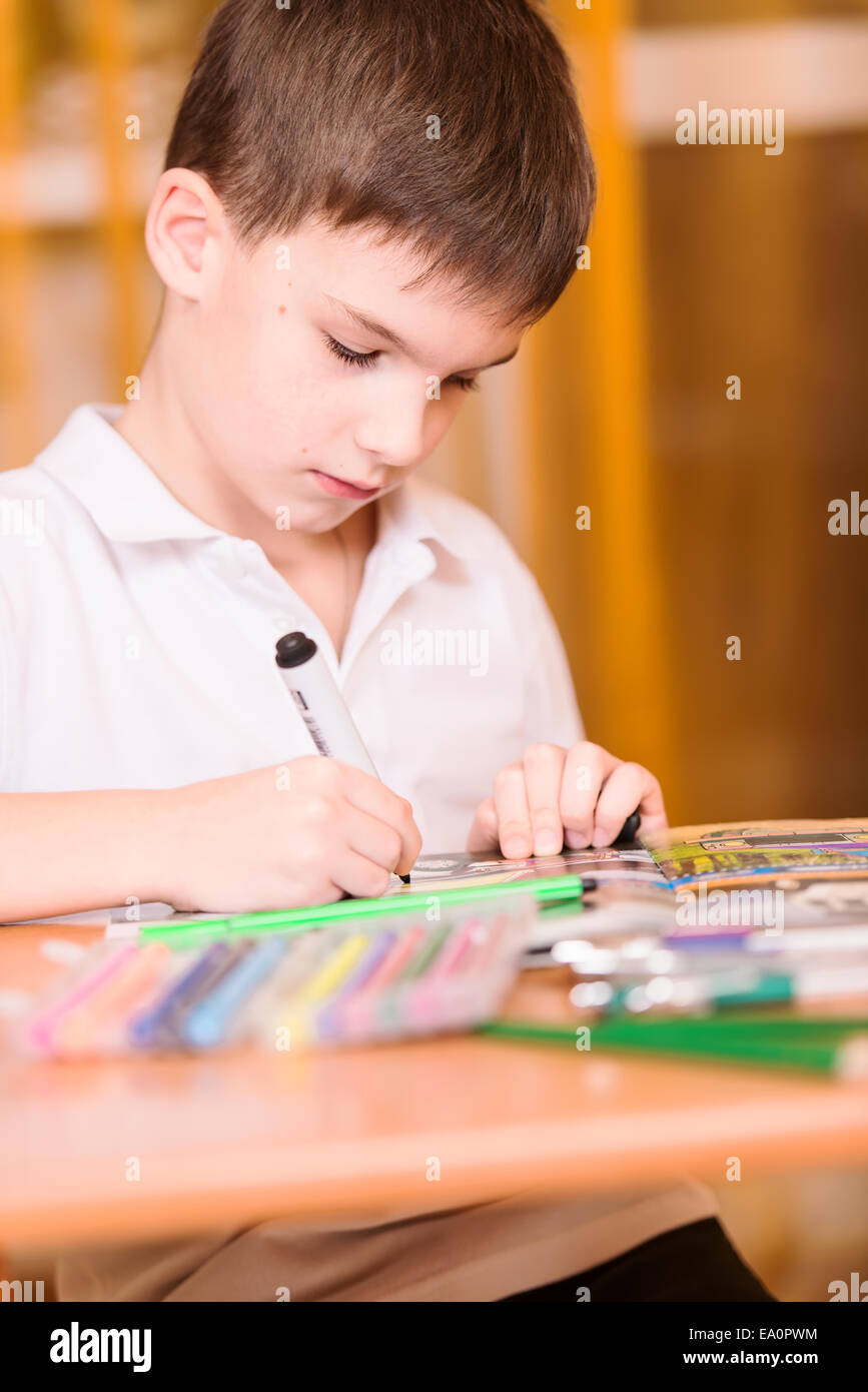 Boy colouring hi-res stock photography and images - Alamy