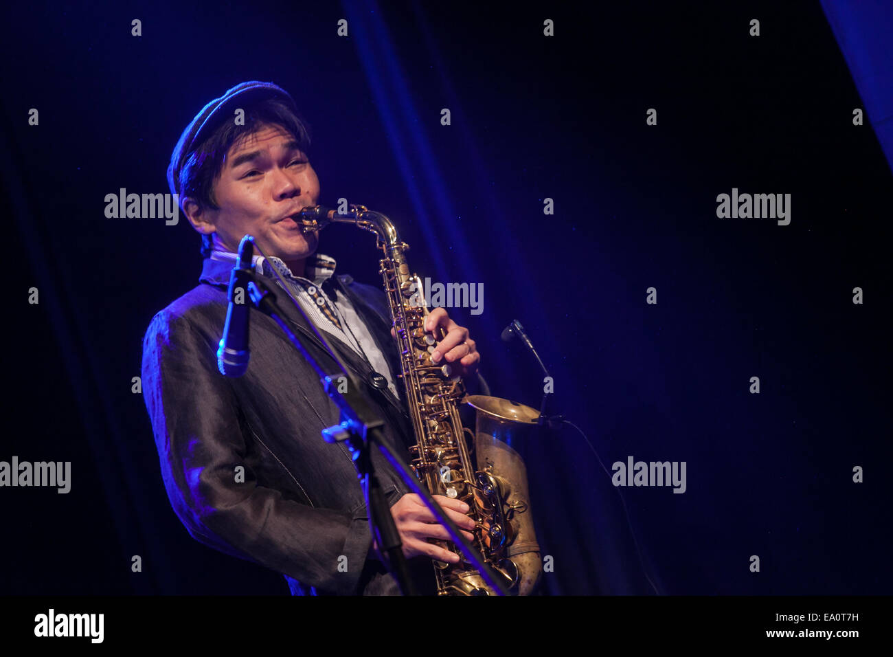 Yosuke Sato plays saxophone for Gregory Porter who sings on stage at 18th Jazz Fest Sarajevo ...