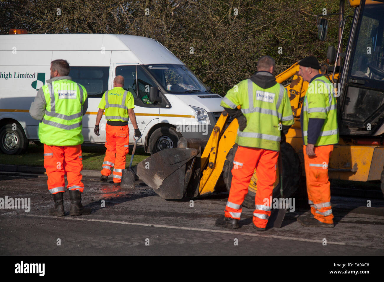 Construction worker asphalting a roadway hi-res stock photography and ...