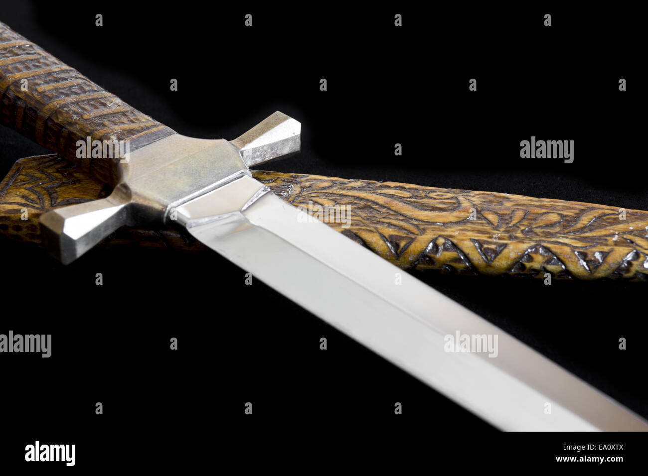 Cold weapon on black background Stock Photo - Alamy