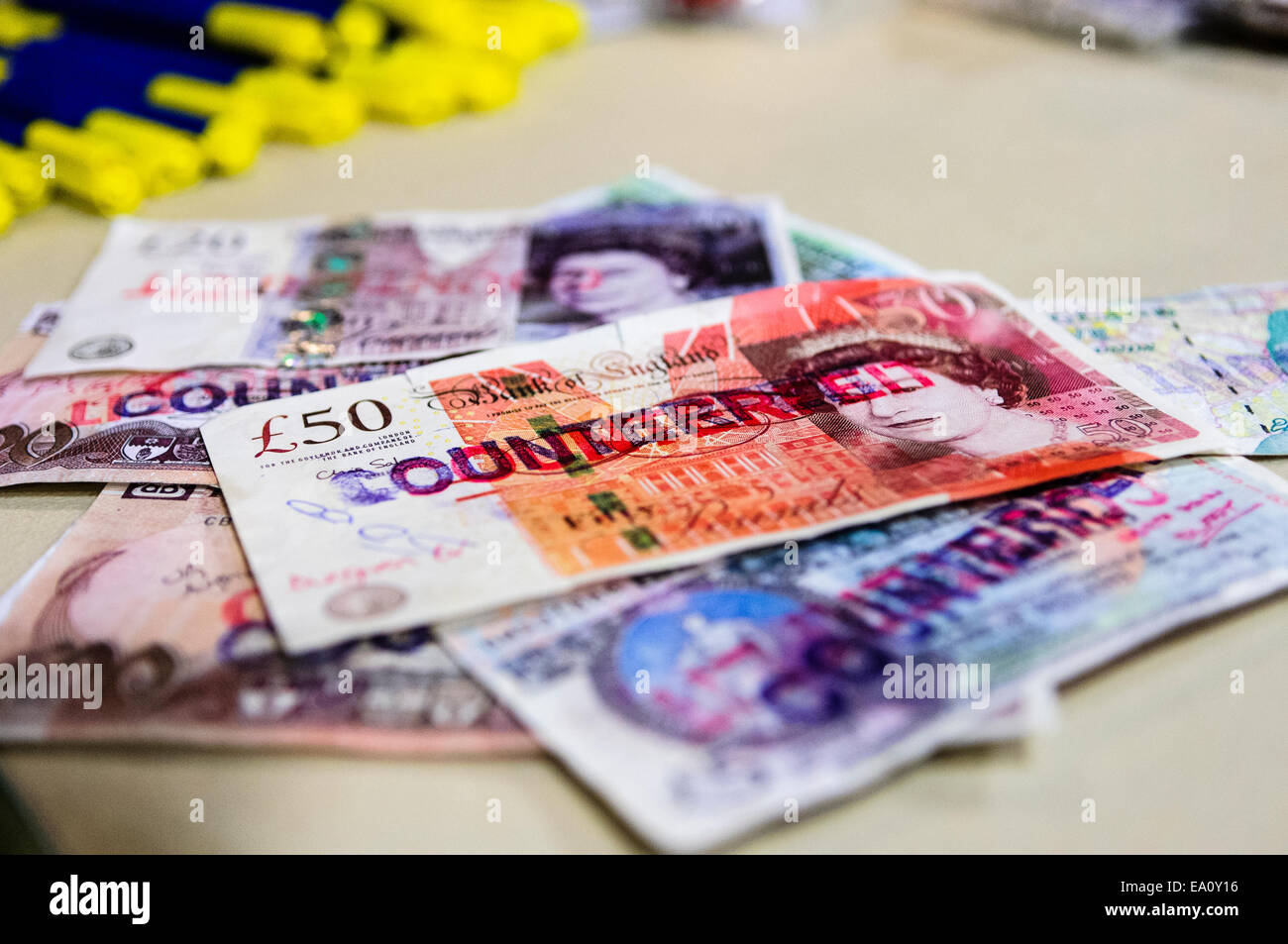 Pile of counterfeit Bank of England and Bank of Ireland banknotes Stock ...