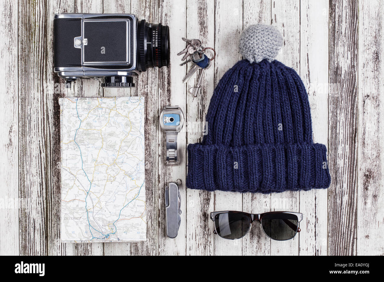 Still life of map with medium format camera and pocket knife Stock ...