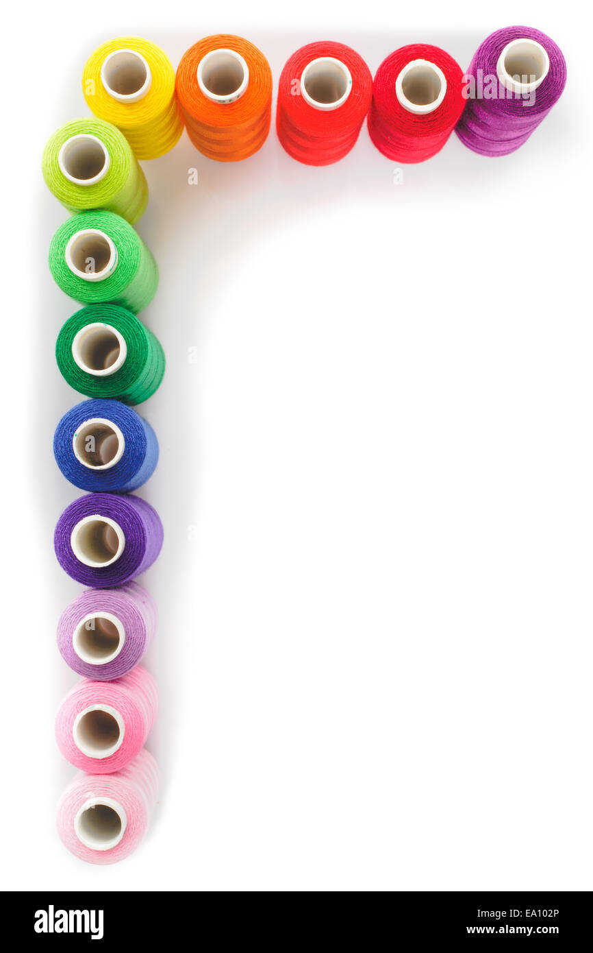 Sewing multicolored threads isolated on a white background Stock Photo ...