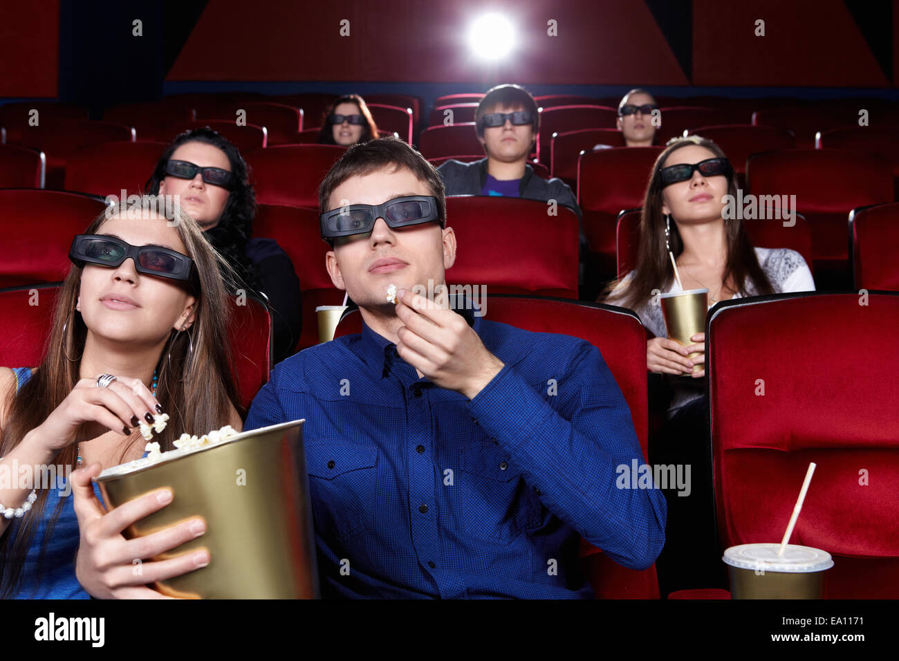 Teenagers watching movie cinema hi-res stock photography and images - Alamy