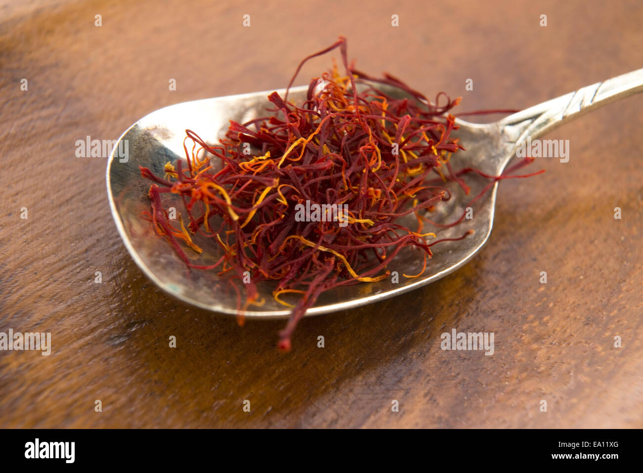stigmas of saffron in spoon Stock Photo - Alamy