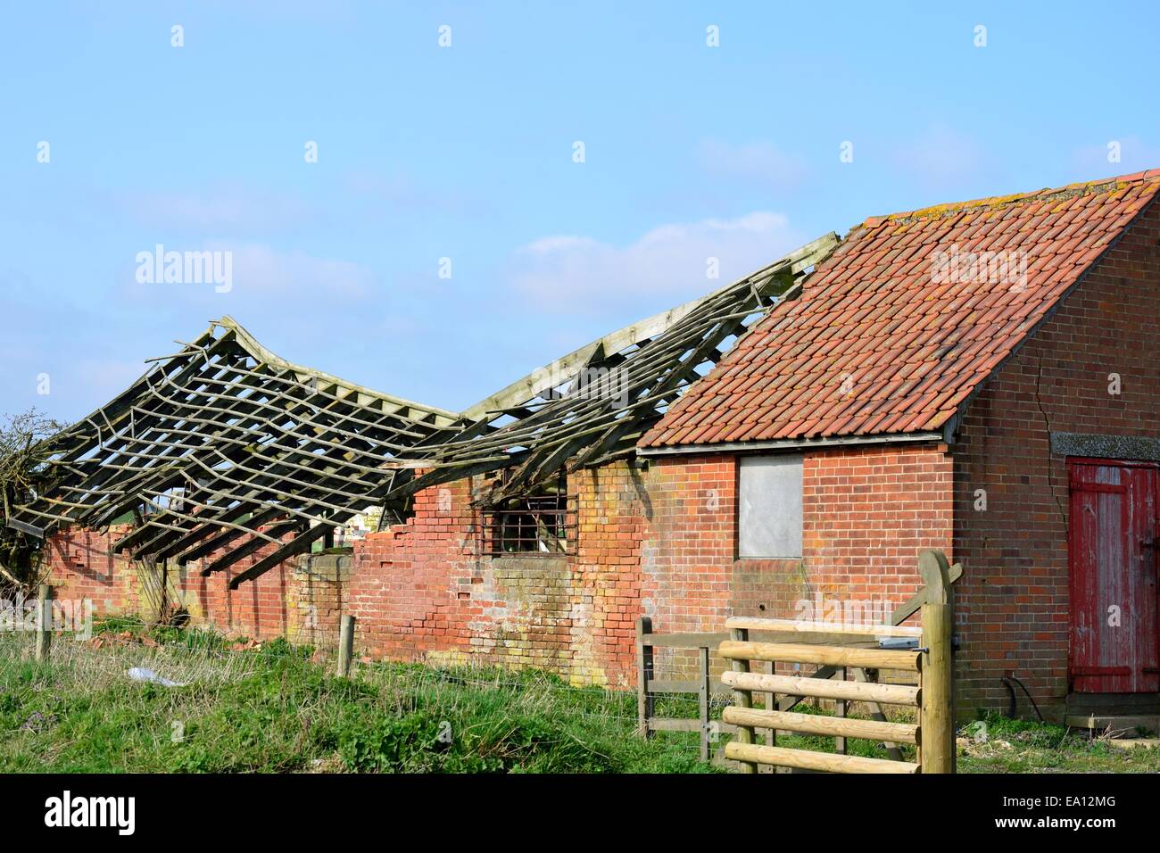 Barn with collapsed roof Stock Photo - Alamy