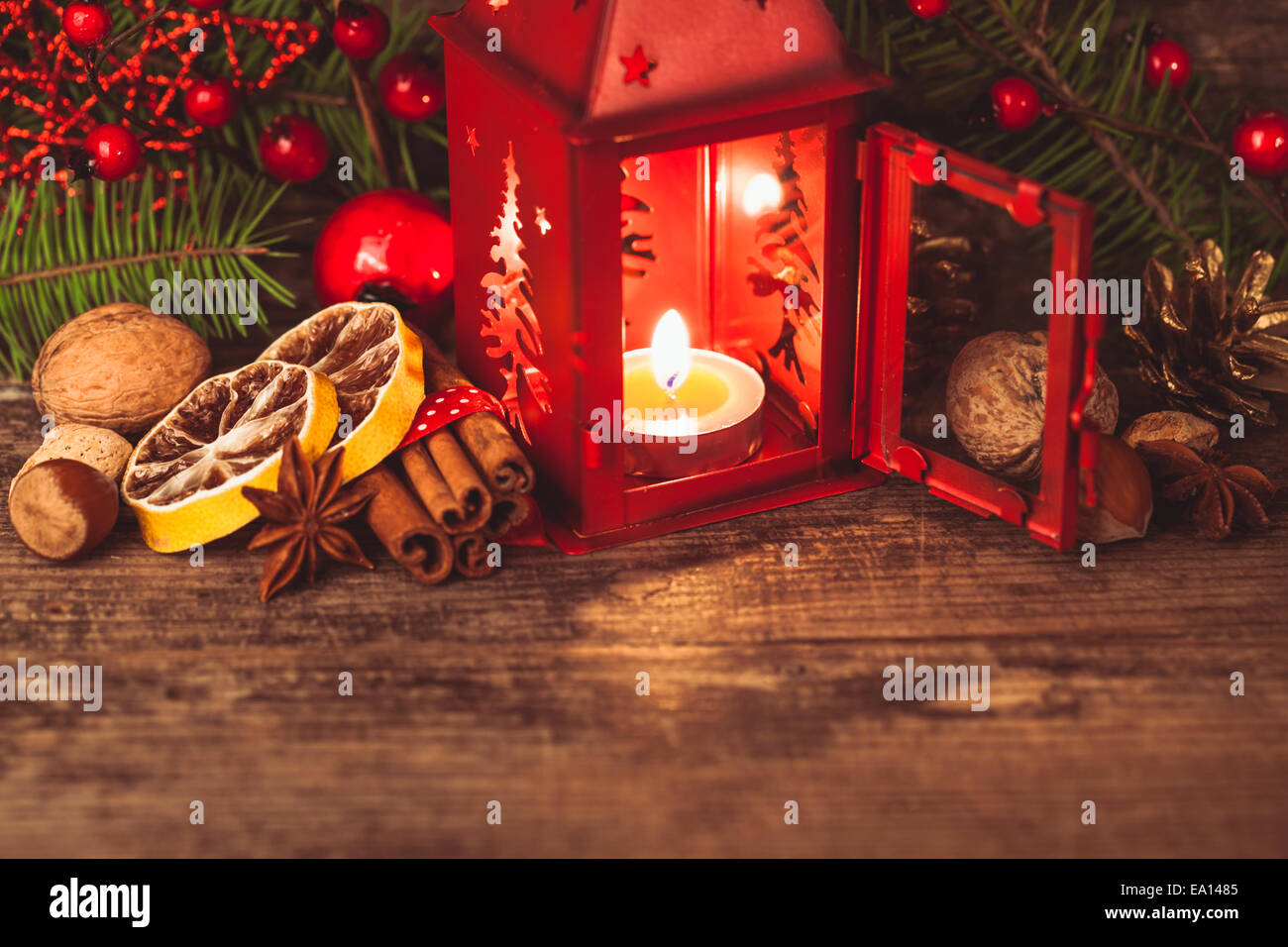Red christmas candlestick and flavours of holidays Stock Photo - Alamy