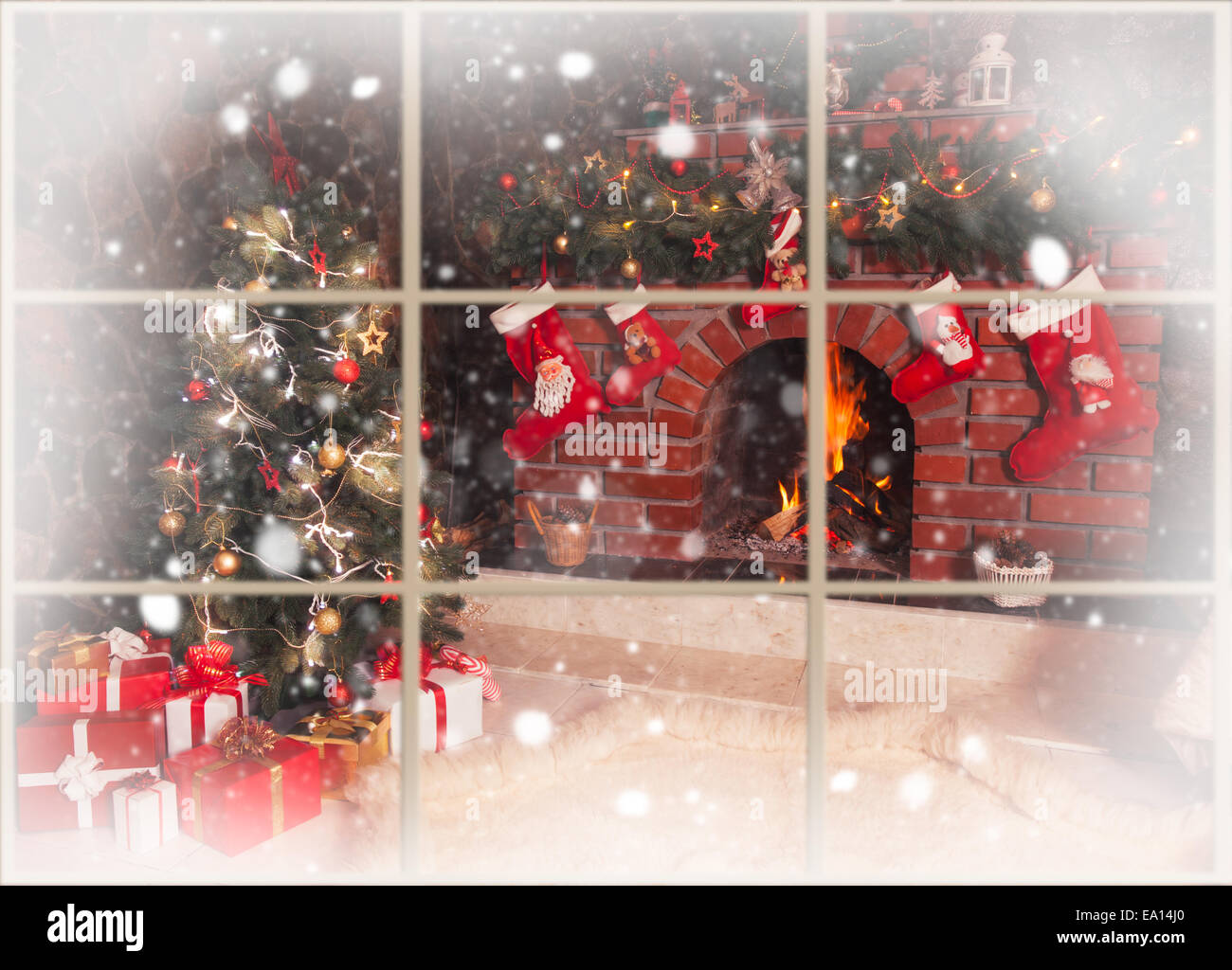 Christmas decorated fireplace and tree in the room - view throw the ...