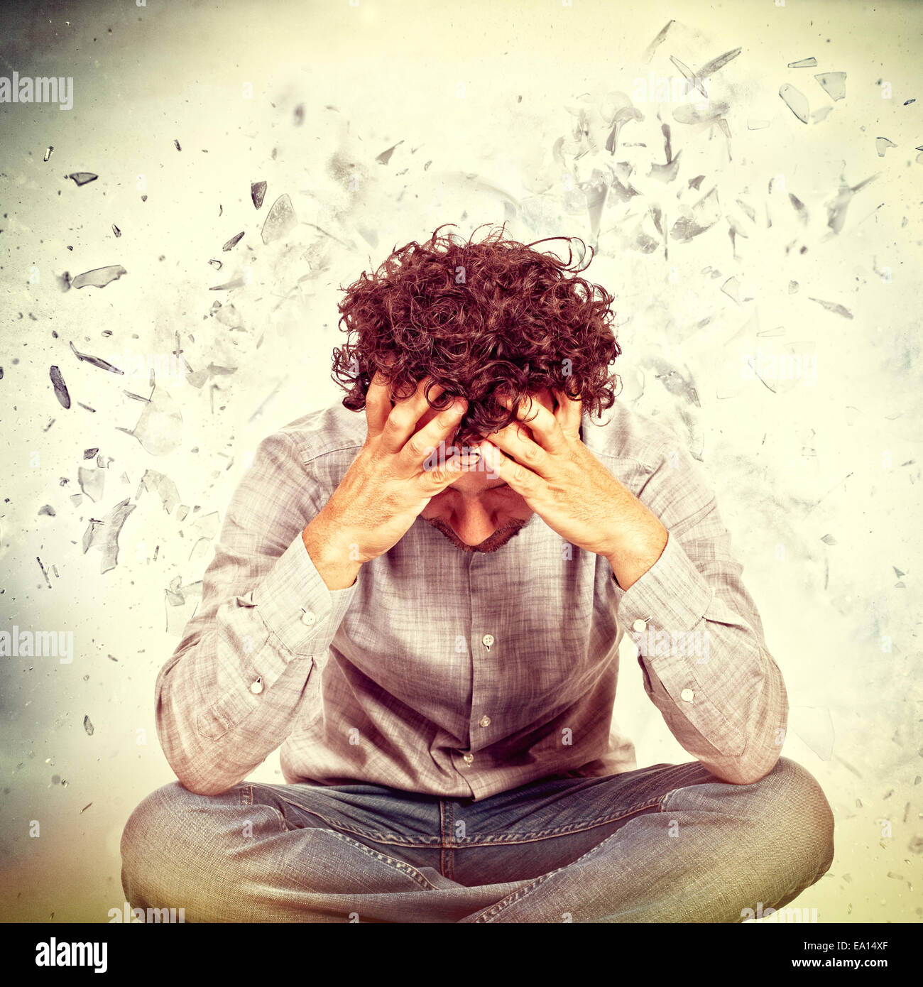stressed man and background explosion Stock Photo - Alamy