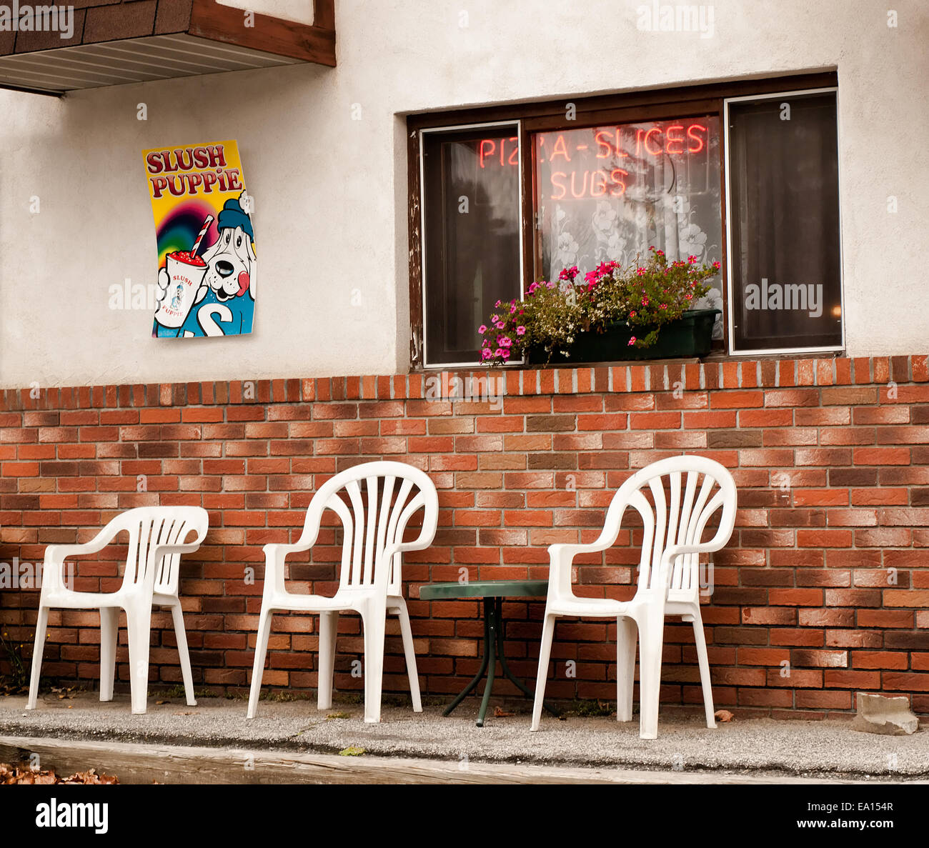 Chairs outside small town hi-res stock photography and images - Alamy