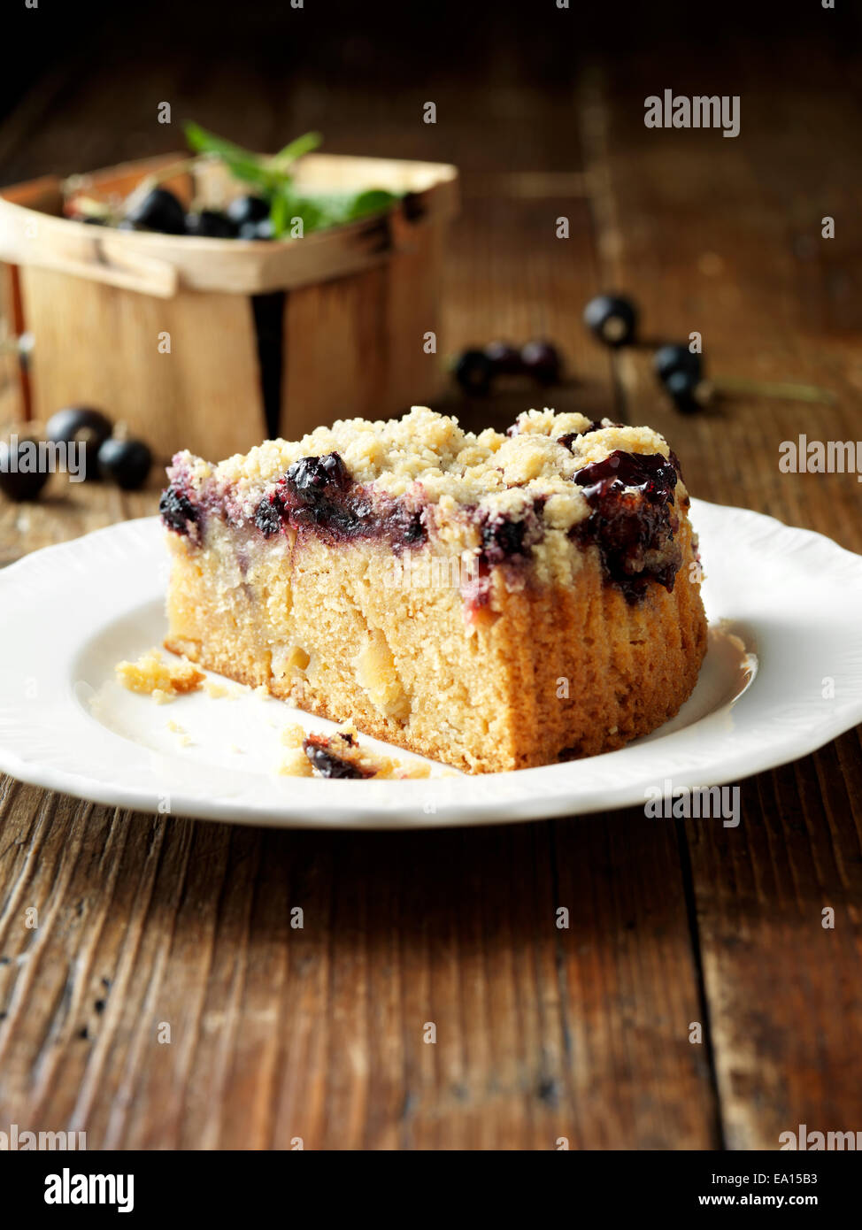 Apple and blackcurrant crumble cake Stock Photo - Alamy