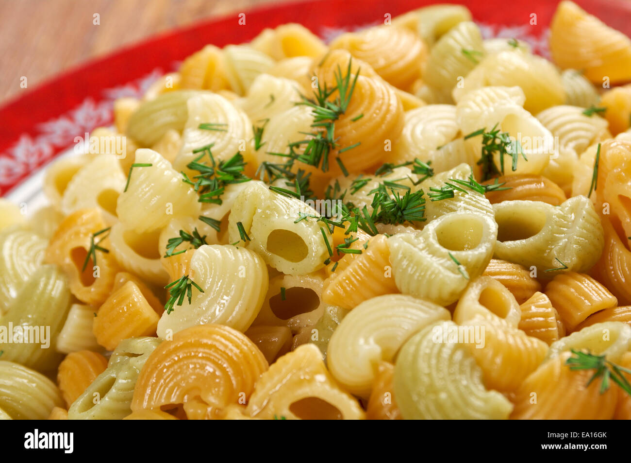 Colorful Italian conchiglie pasta Stock Photo - Alamy