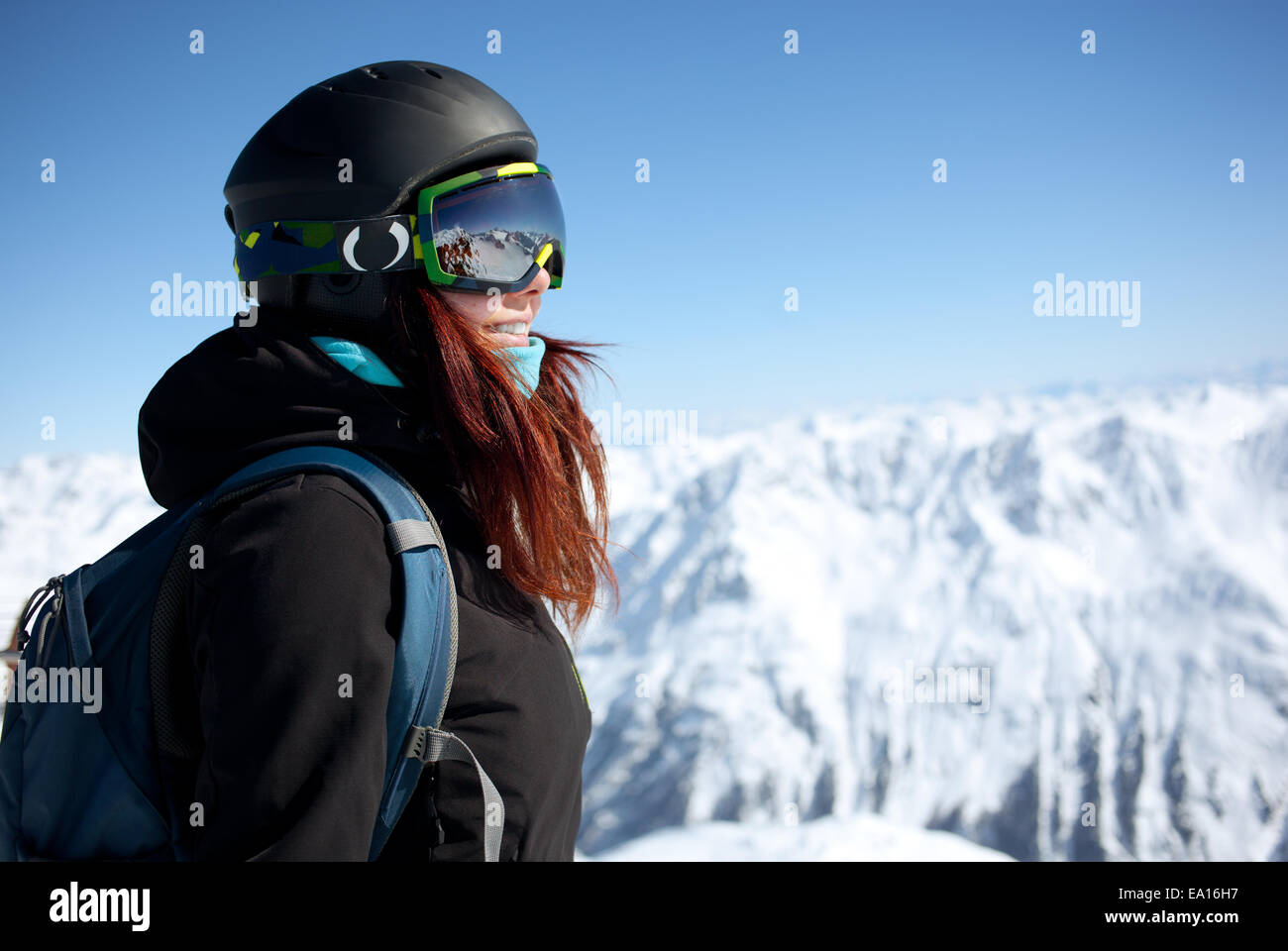 Woman on summit in alps Stock Photo - Alamy