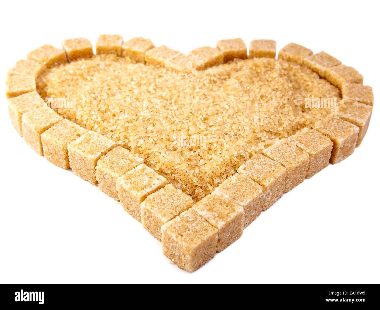 Heart from not refined reed granulated sugar Stock Photo - Alamy