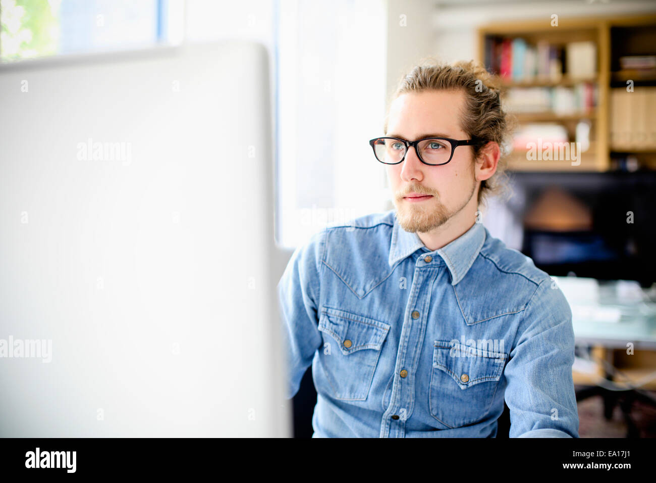Graphic designer working at computer Stock Photo - Alamy