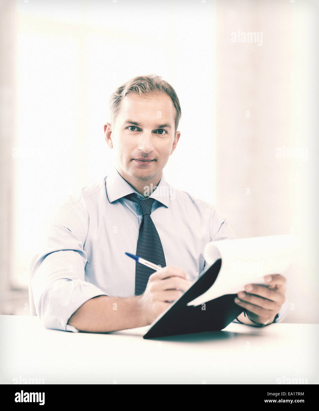 Interviewer taking notes hi-res stock photography and images - Alamy