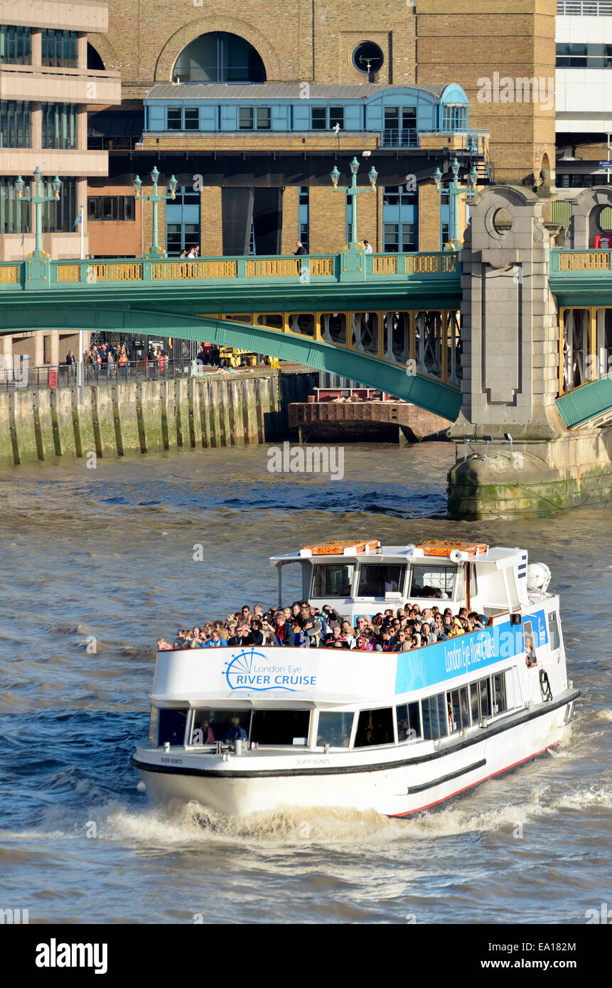 London, England, UK. London Eye River Cruise tourist boat passing under ...