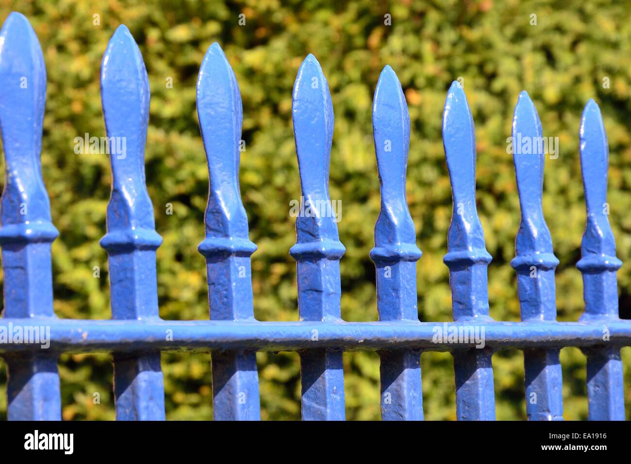 Cast iron blue fence Stock Photo - Alamy