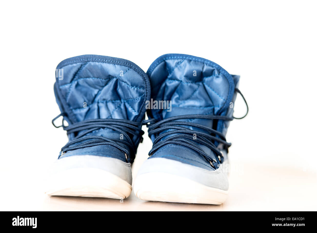 Pair of dark blue female boots with string Stock Photo - Alamy
