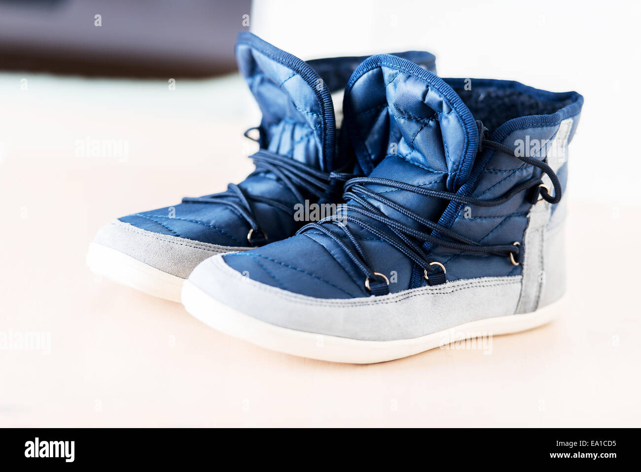 Pair of dark blue boots Stock Photo - Alamy