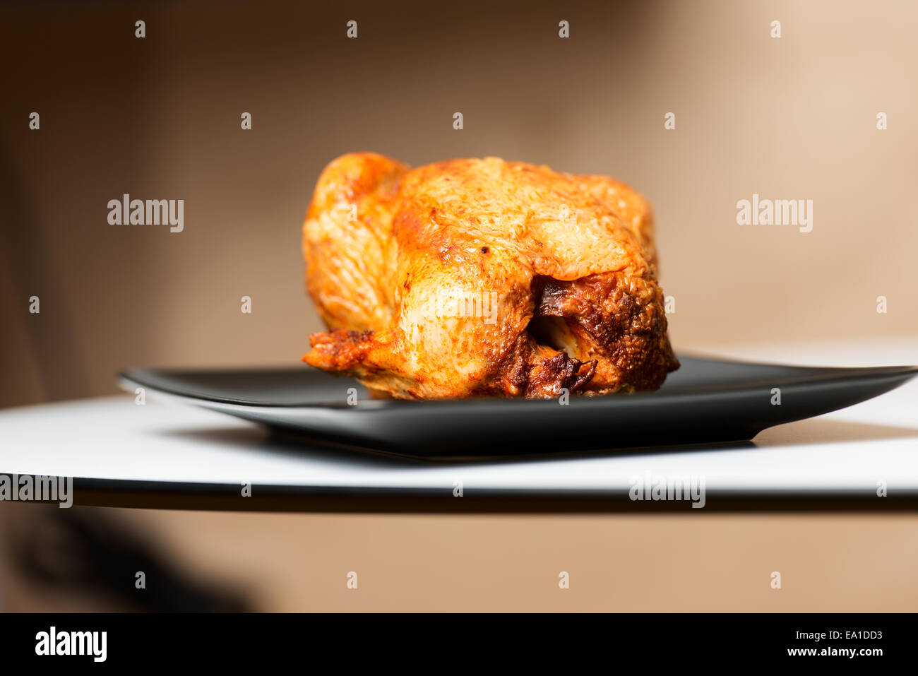 Roasted chicken on plate Stock Photo - Alamy