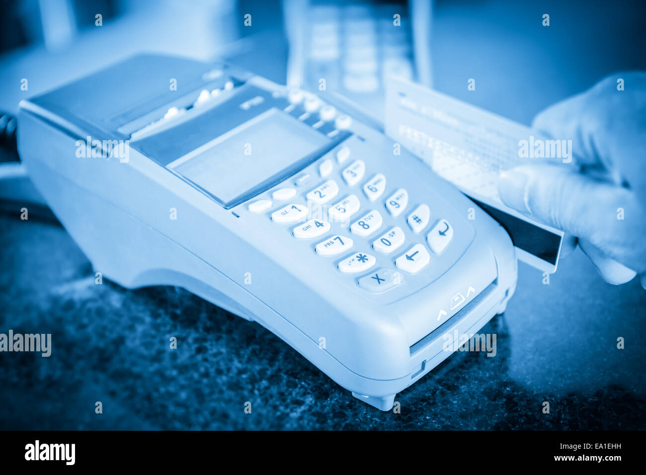 credit card swipe through terminal for sale Stock Photo - Alamy