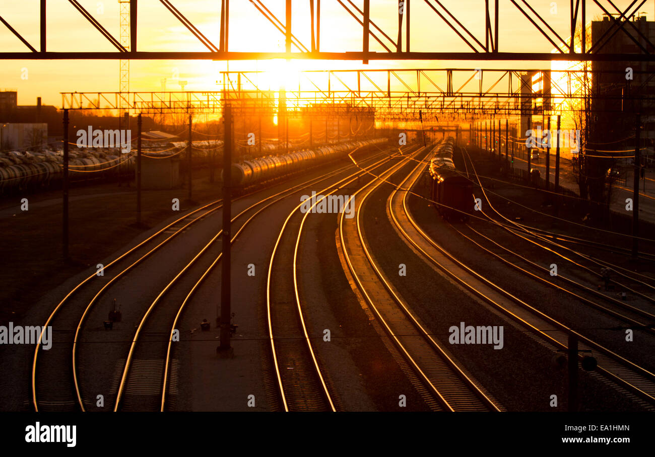 railroad station at sunset Stock Photo - Alamy