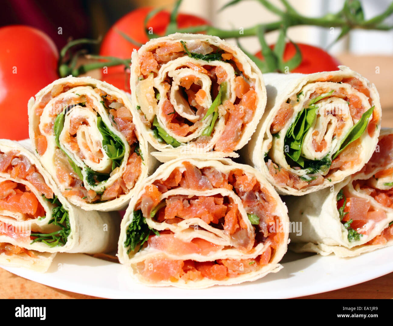 Lavash rolls with salmon Stock Photo - Alamy