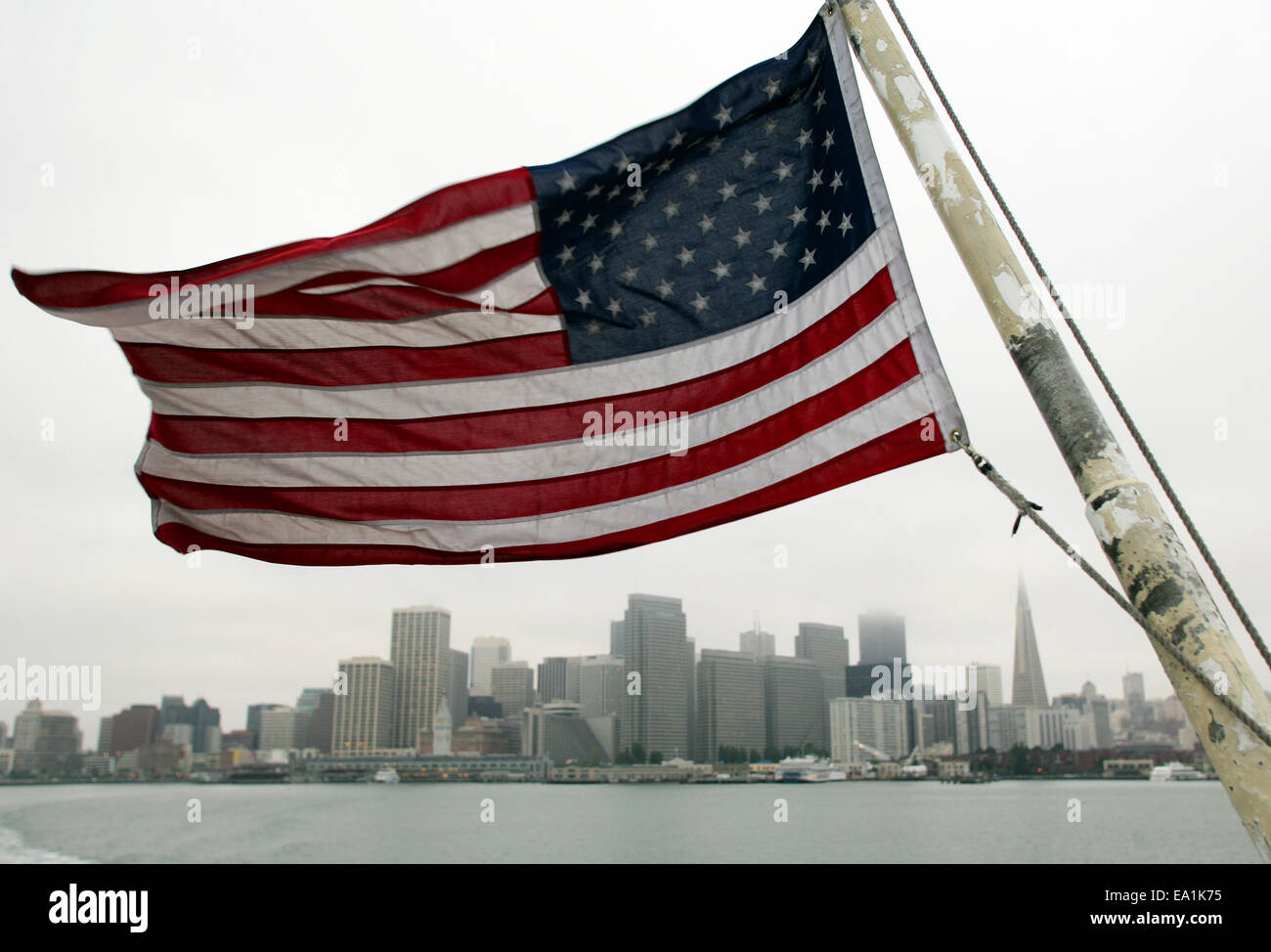San Francisco, national flag over skyline. California CA USA Stock ...