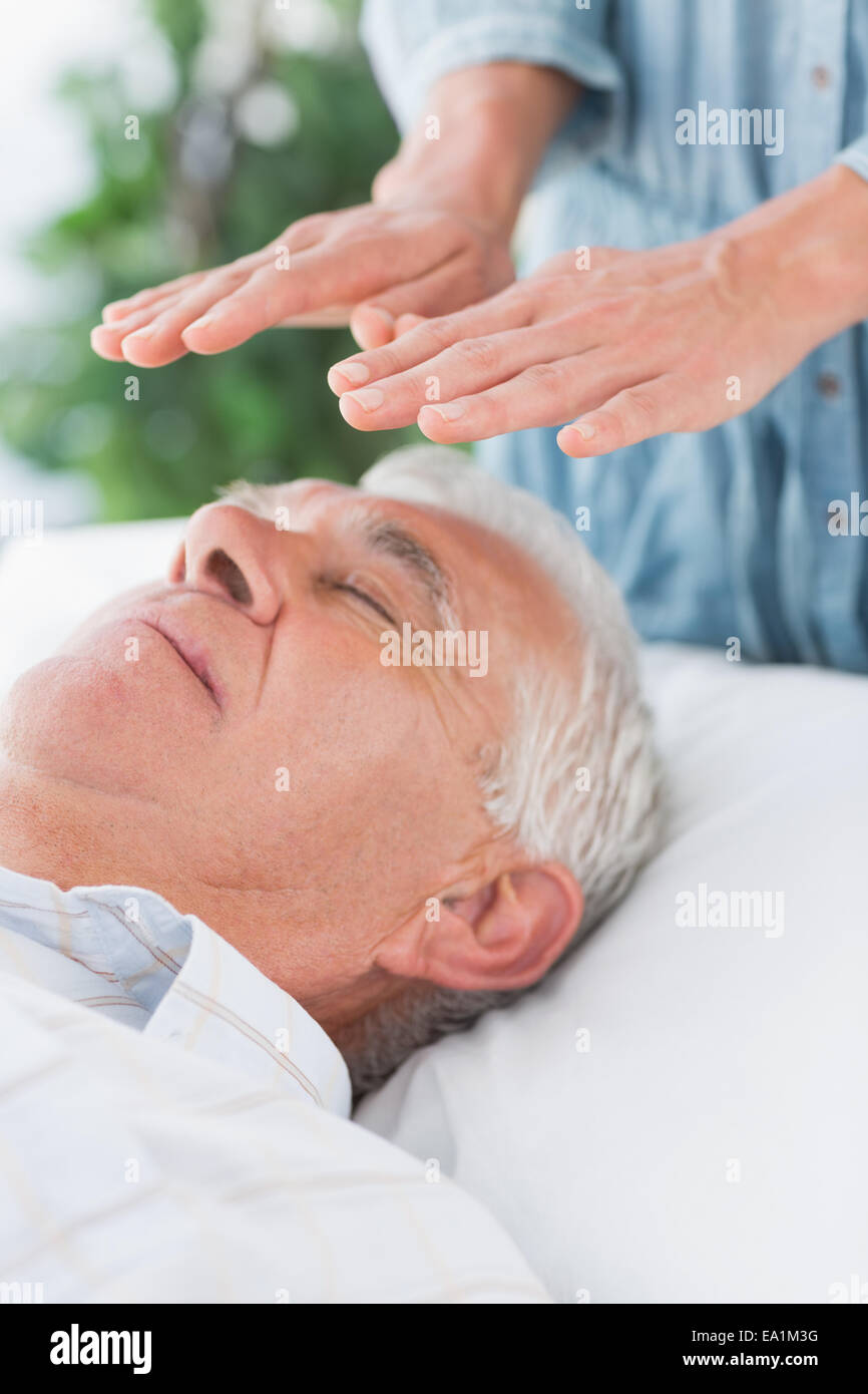 Man reiki hi-res stock photography and images - Alamy
