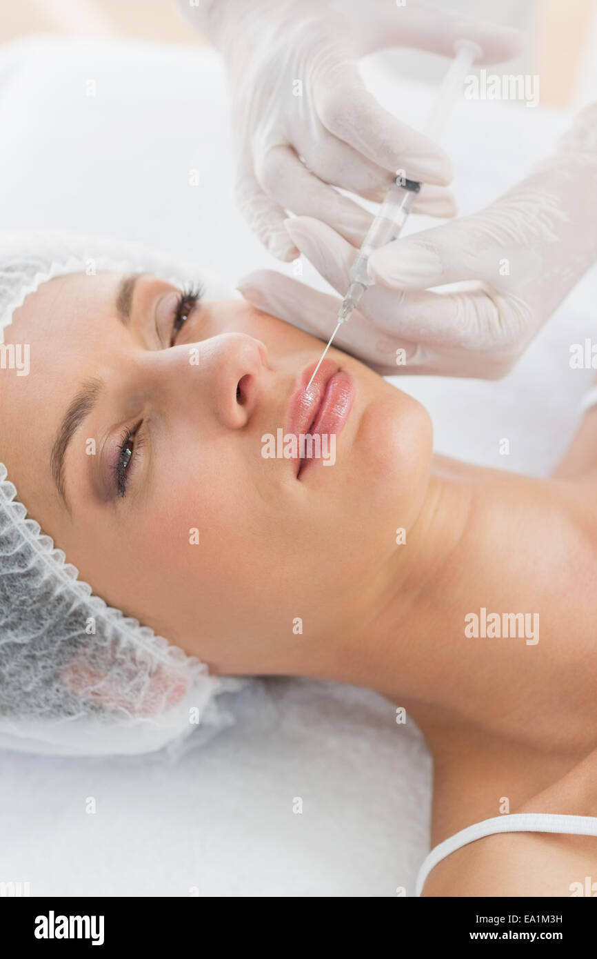 Injecting botox female lips hi-res stock photography and images - Alamy