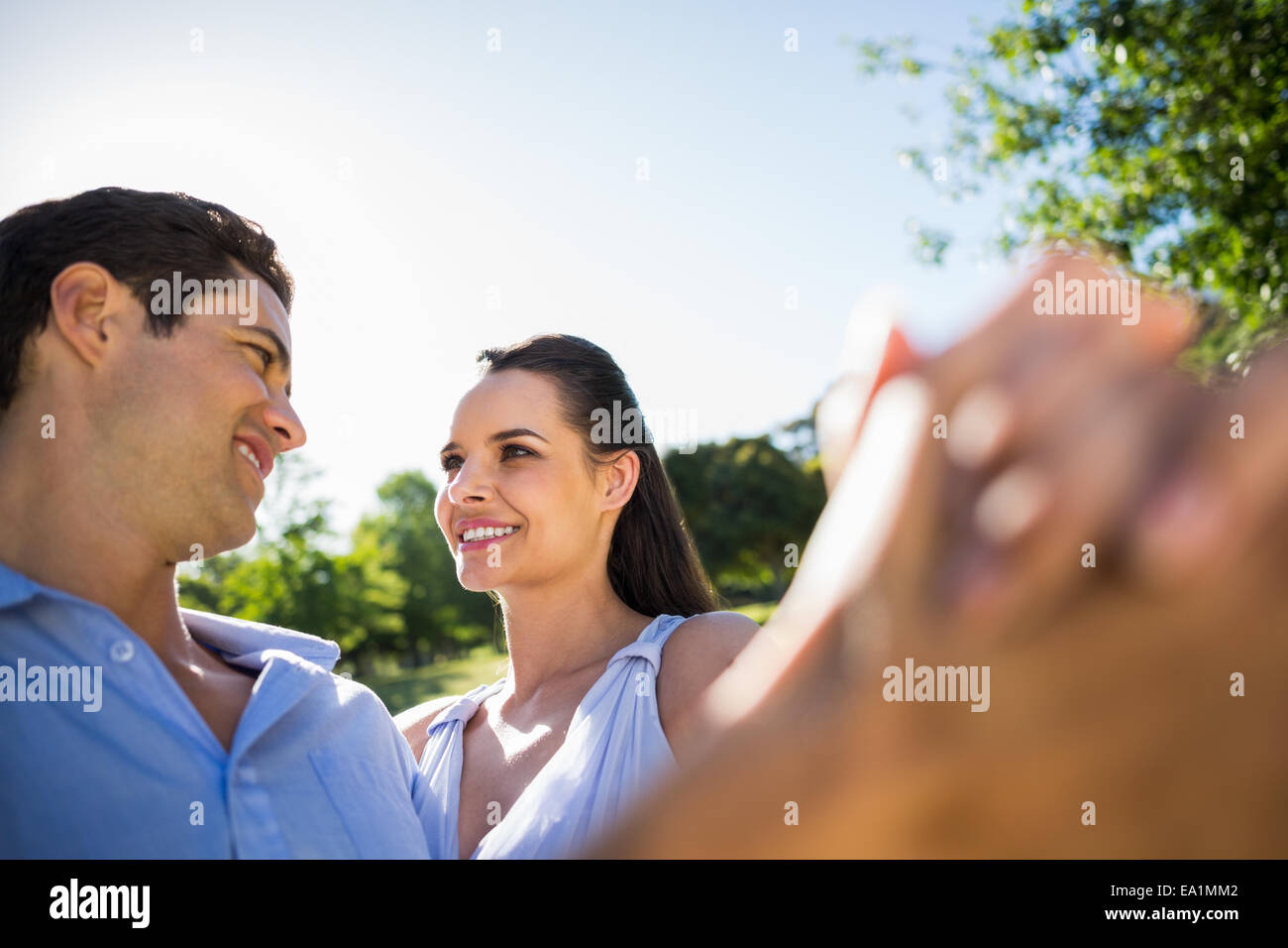 Couple smiling dancing hands up hi-res stock photography and images - Alamy