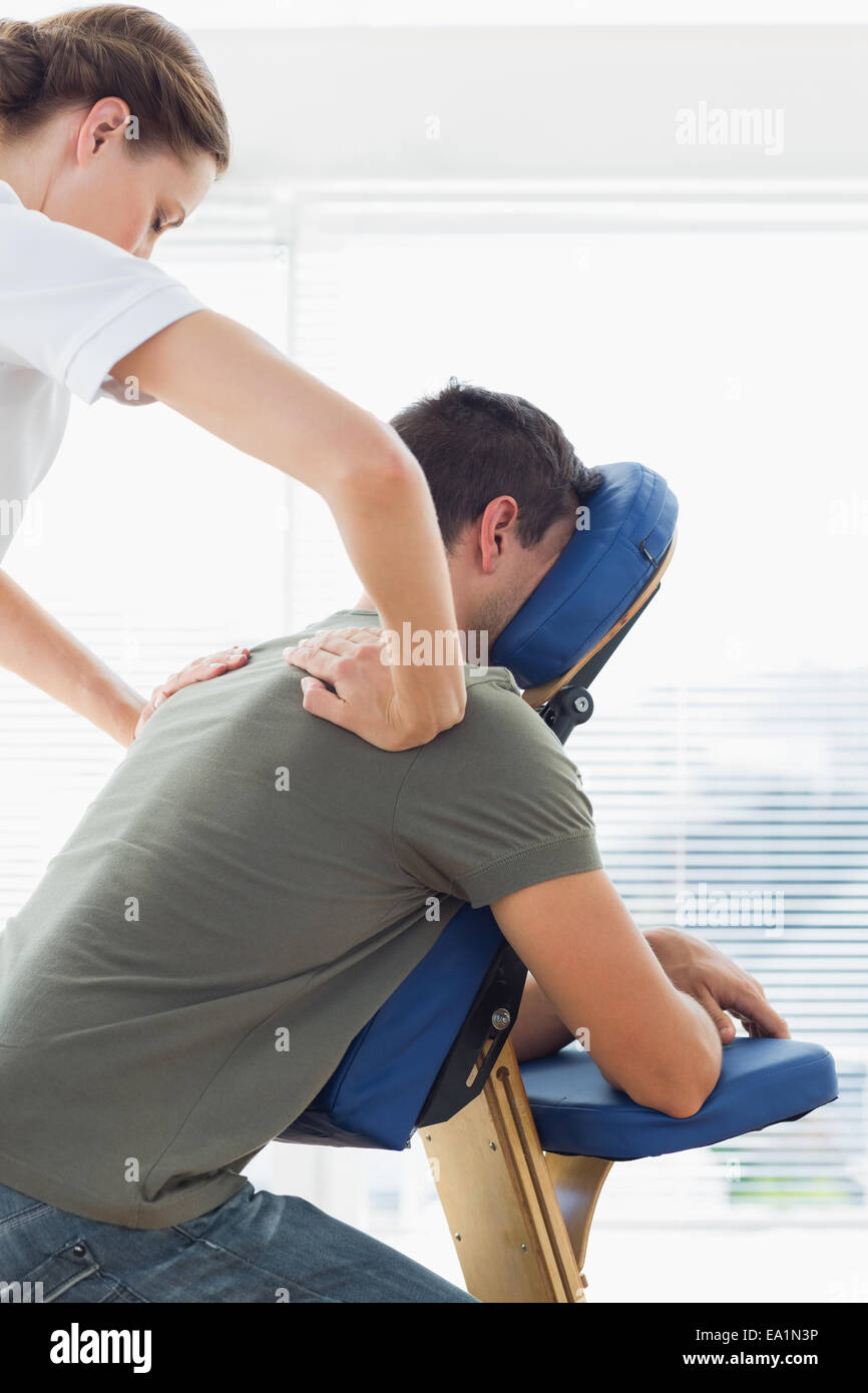 Man receiving back massage from therapist Stock Photo - Alamy