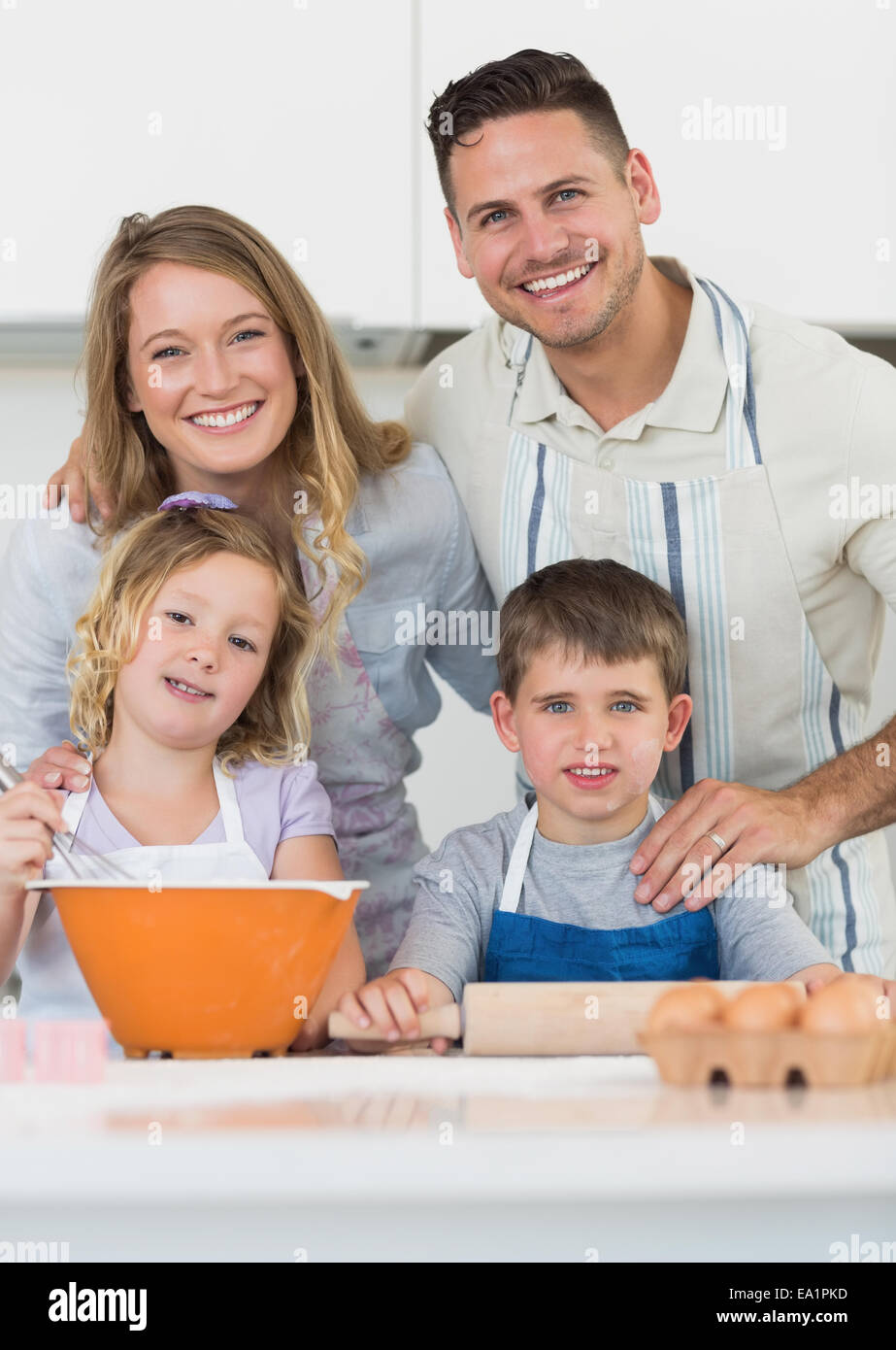 Family baking cookies at kitchen counter Stock Photo - Alamy
