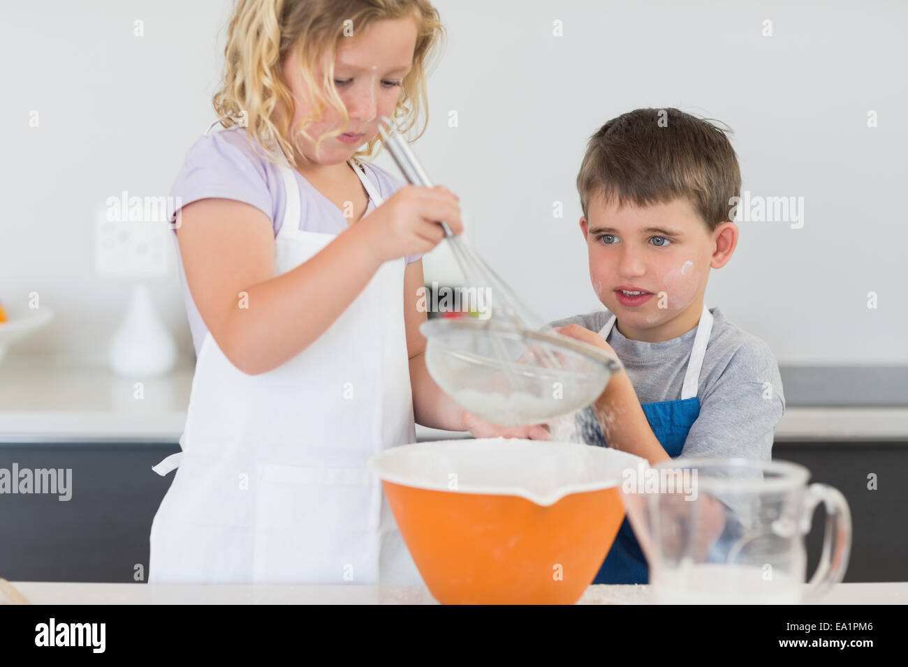 Children preparing cookies in hi-res stock photography and images - Alamy