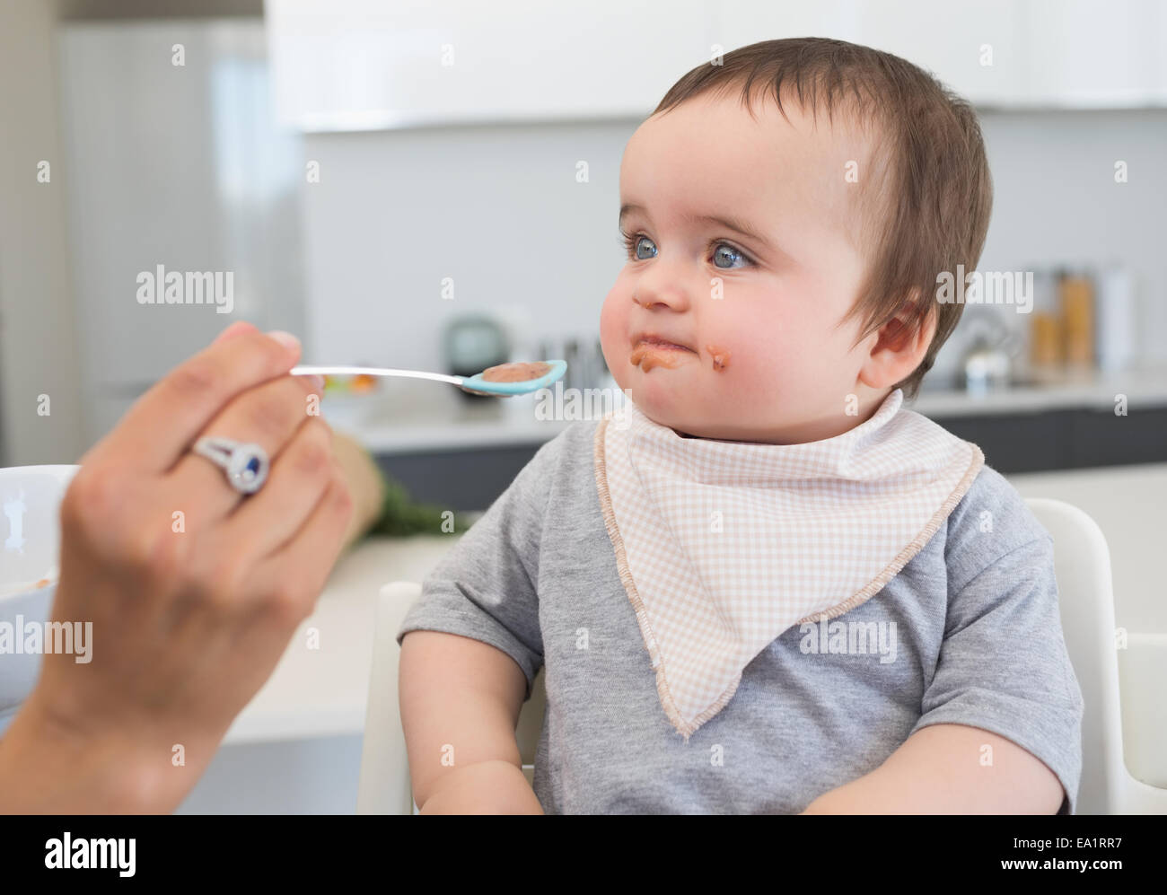 Toddler being fed High Resolution Stock Photography and Images - Alamy