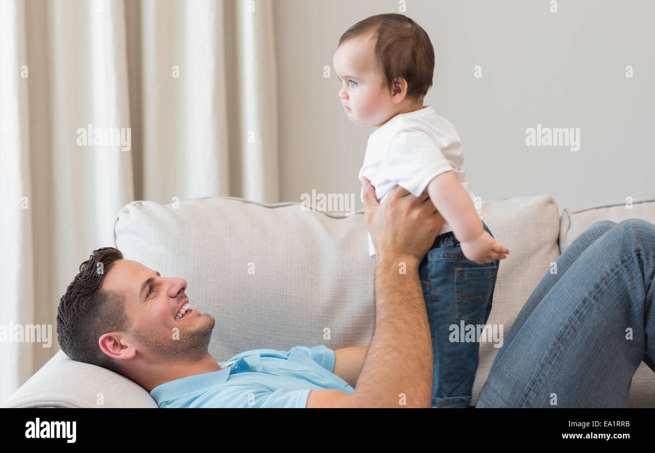 Father playing with baby Stock Photo - Alamy